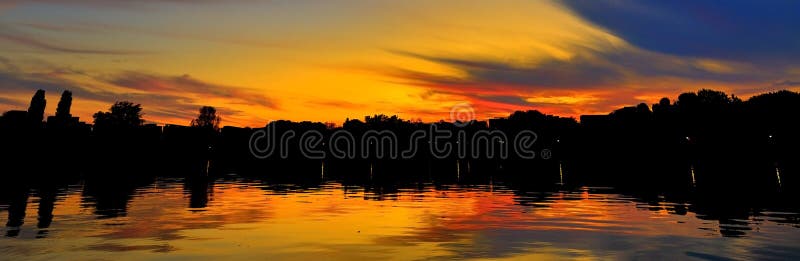 Peaceful Sunset On A Calm Lake Stock Photo - Image of serene, colour ...