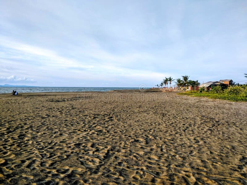 Quiet Beach Atmosphere in the Afternoon, Fishing Boats and Cloudy Skies ...