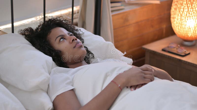 Peaceful Young African Woman Sleeping in Bed Stock Image - Image of ...