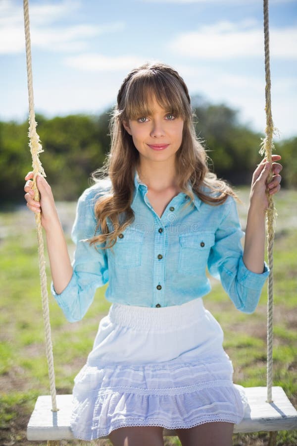Peaceful Young Model Relaxing while Sitting on Swing Stock Photo ...
