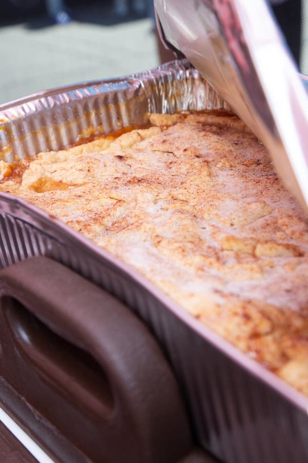 Peach Cobbler in Catering Tray Stock Photo - Image of store, table ...