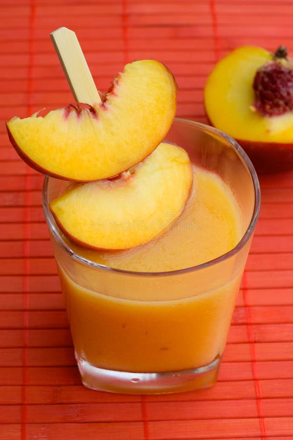 Peach cocktail drink stock photo. Image of sliced, drink - 81737234