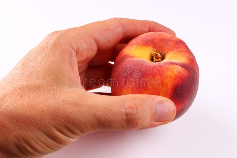 Peach in Hand on a White Background Closeup Stock Photo - Image of ripe ...