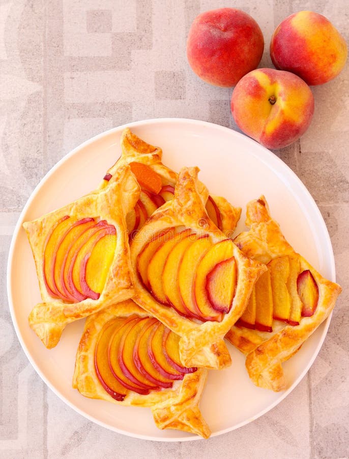 Peach puff pastry cakes stock image. Image of copy, slice - 321447087