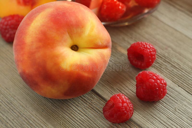 Peach and raspberries stock photo. Image of healthy, orange - 75083856