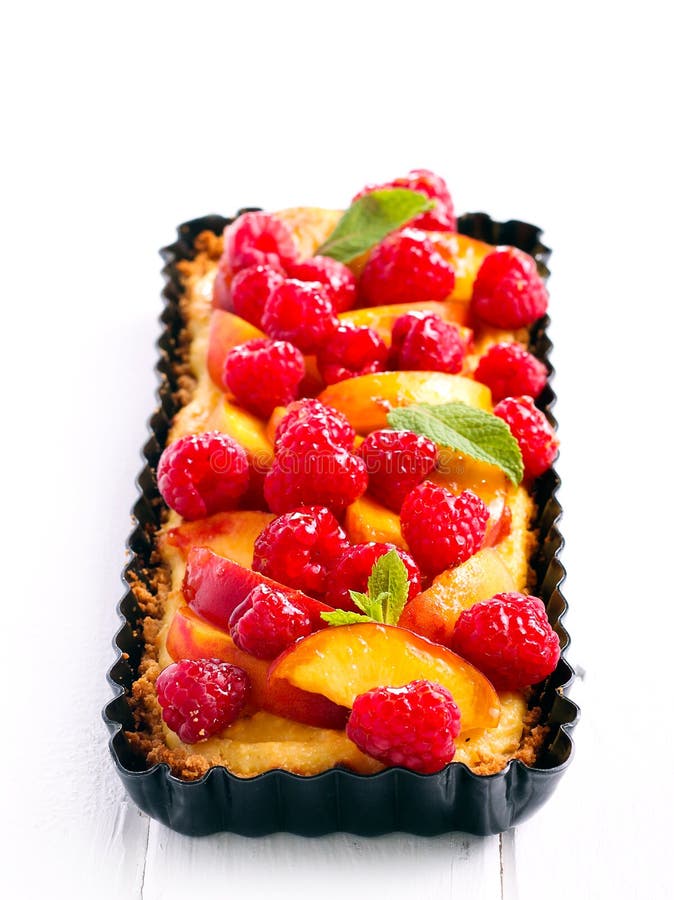 Peach and Raspberry Cheesecake Tart Stock Photo - Image of dessert ...