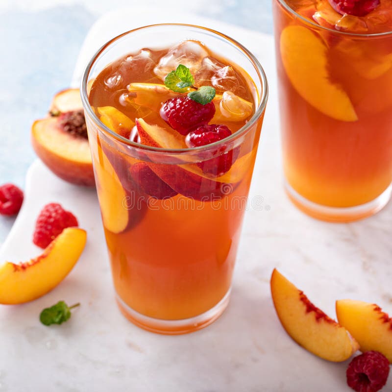 Peach and Raspberry Iced Tea or Cocktail Stock Photo - Image of ...