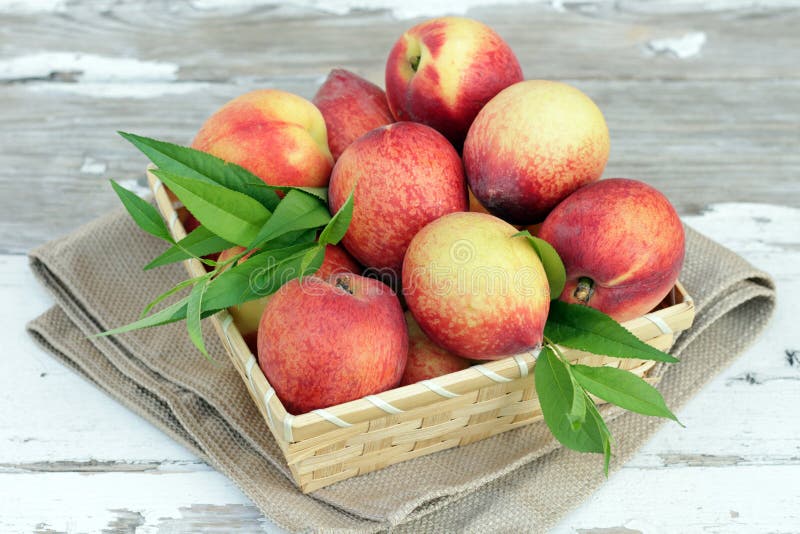 Peach on the table stock photo. Image of summer, organic - 77675630