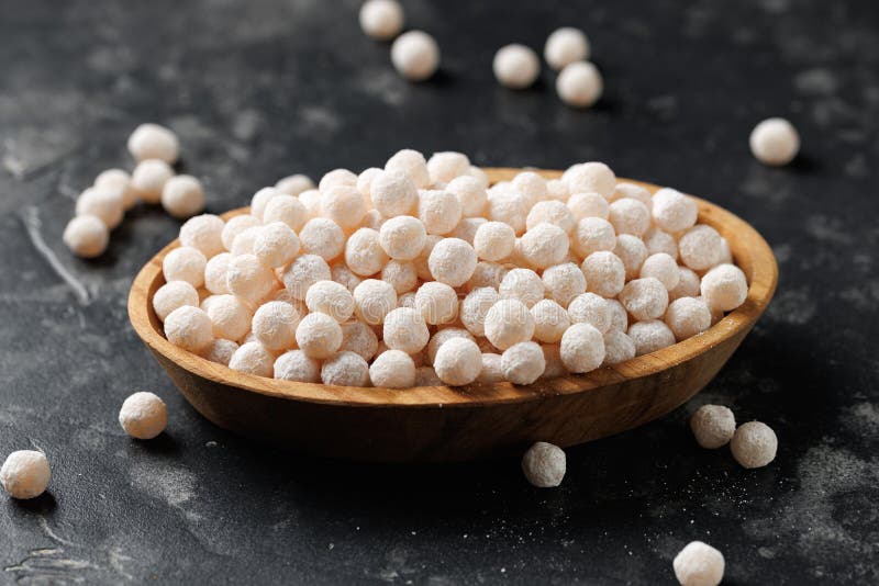 Peach Uncooked Tapioca Pearls in Wooden Bowl Stock Image - Image of ...