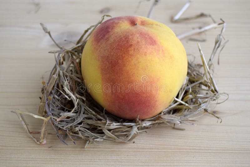 The Peach is on a Wooden Table. Fruit is Large, Yellow, Fresh, Ripened ...