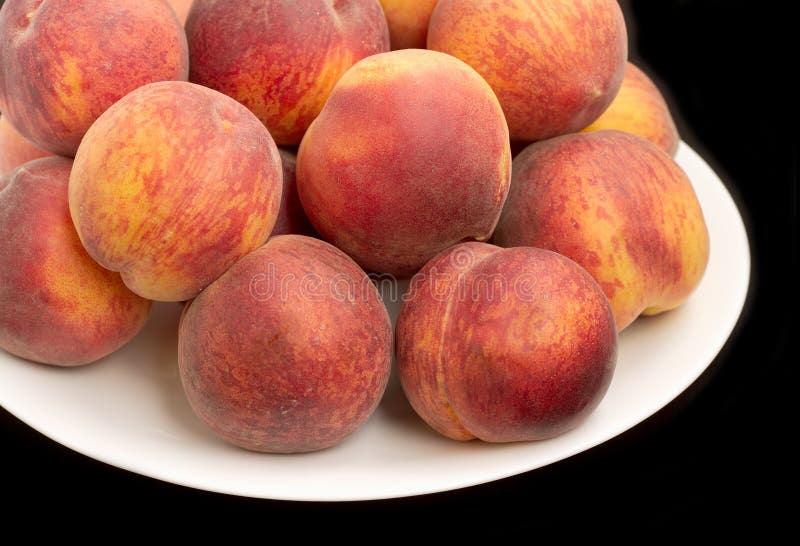 Peaches on plate stock photo. Image of food, details - 21382734