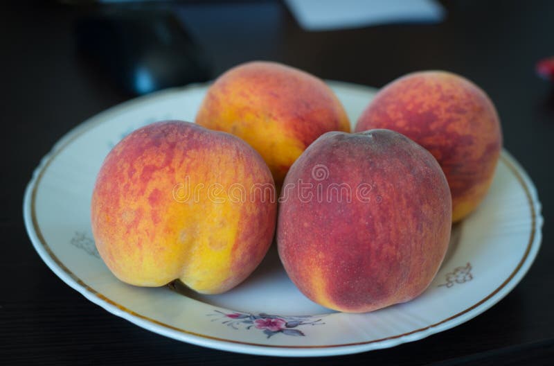Peaches on a plate stock photo. Image of peach, juicy - 97055390