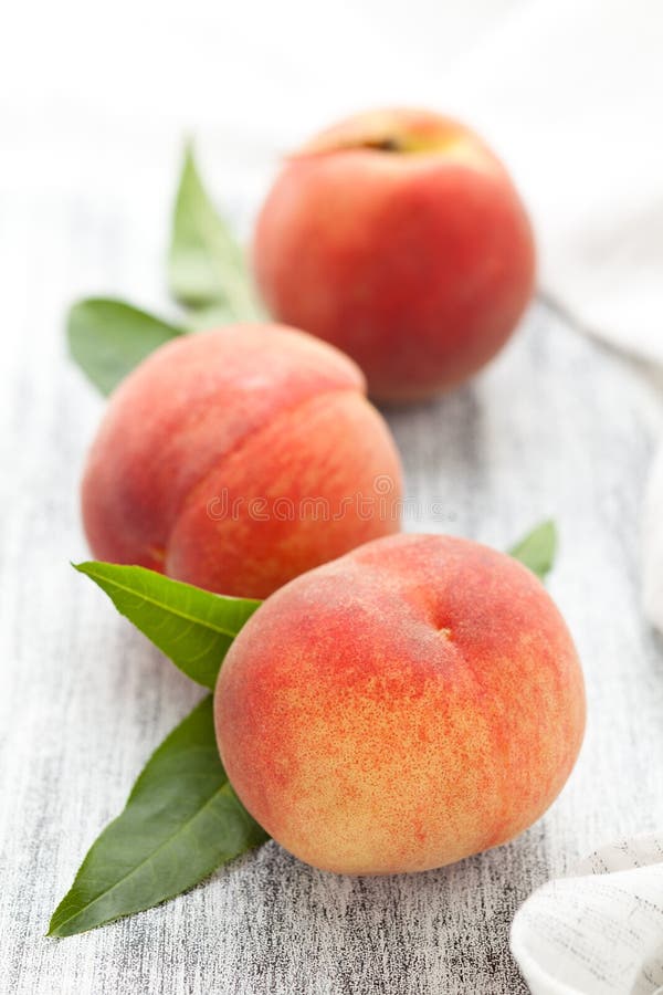 Peaches on rustic table. stock photo. Image of juicy - 50189406
