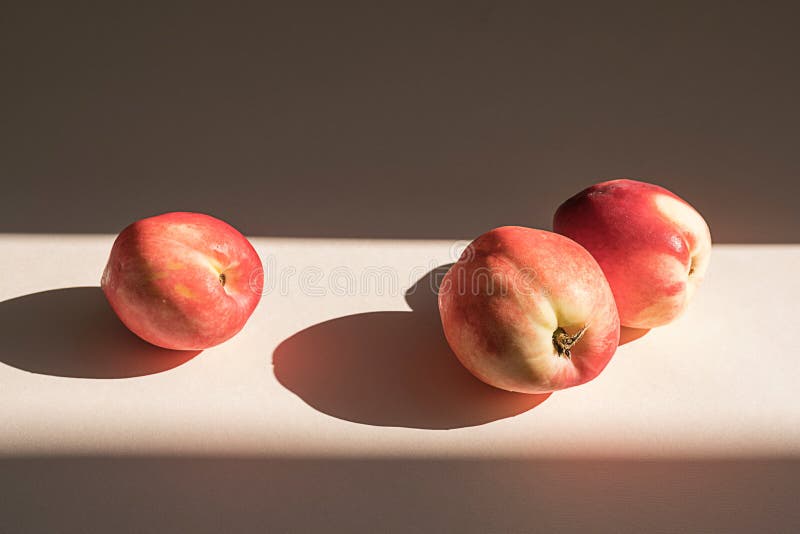 Peaches in Sunlight. Minimalism, Trendy Still Life with Shadow Stock ...