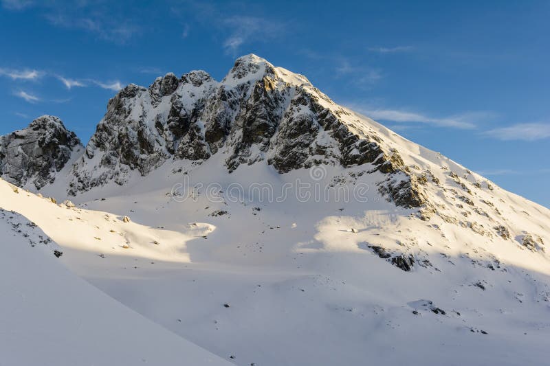 The Peak (Kozi Vrch, Kozi Wierch) Illuminated by the Rays of the ...