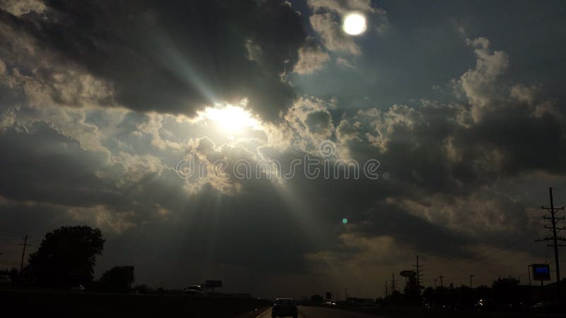 Peaking Sun stock photo. Image of bright, nature, clouds - 51728208