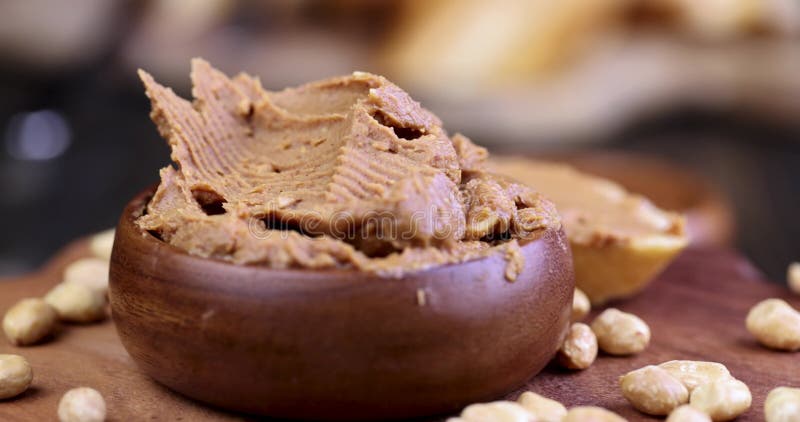 Peanut Butter with Chunks of Crushed Peanuts and Whole Peanuts Stock ...