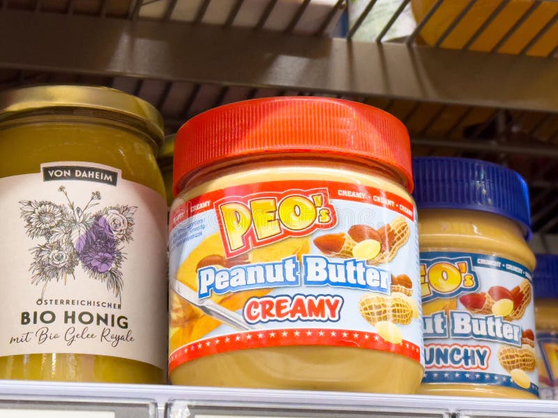 Peanut Butter and Honey Jars Displayed on Grocery Store Shelf Editorial ...