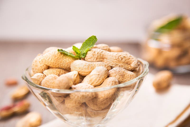 Peanut in container stock image. Image of organic, brown - 57188363