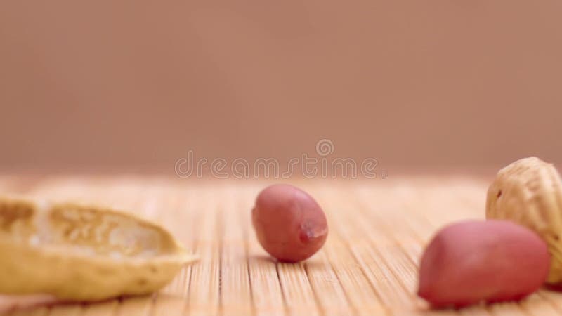 Peanut is Falling on Burlap in Slow Motion. a Pile of Uncooked Nuts ...