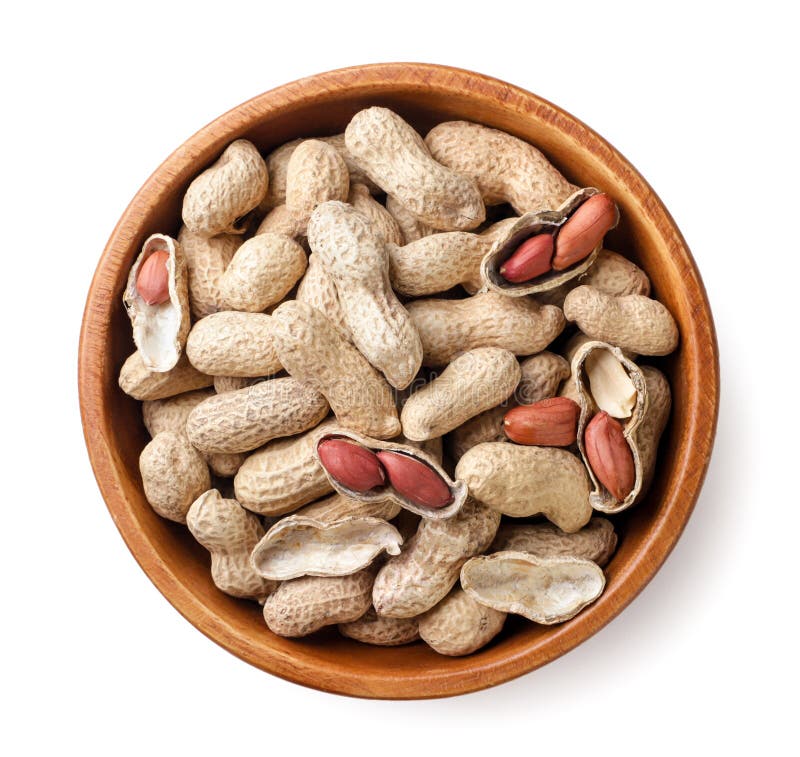 Peanut Nuts in a Shell Wooden Plate on a White Background. Top View ...