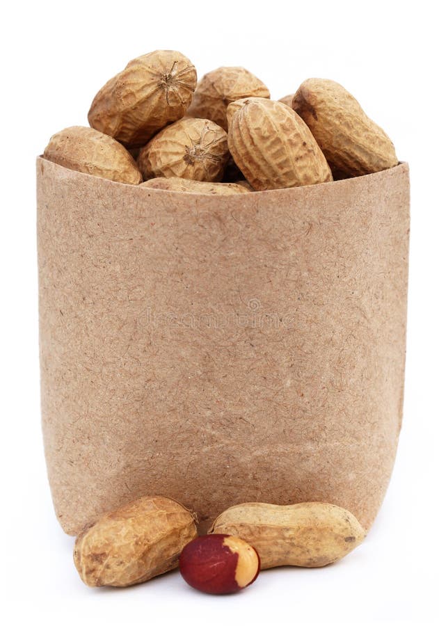 Peanut with a paper pack stock photo. Image of close - 39952614