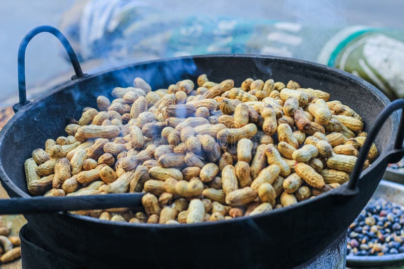 A Peanut Seller Keeps Frying Peanuts in a Van, Fried Peanuts Stock ...