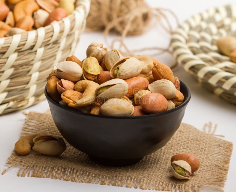 Peanut Served in a Bowl Isolated on Napkin Side View of Nuts on Grey ...