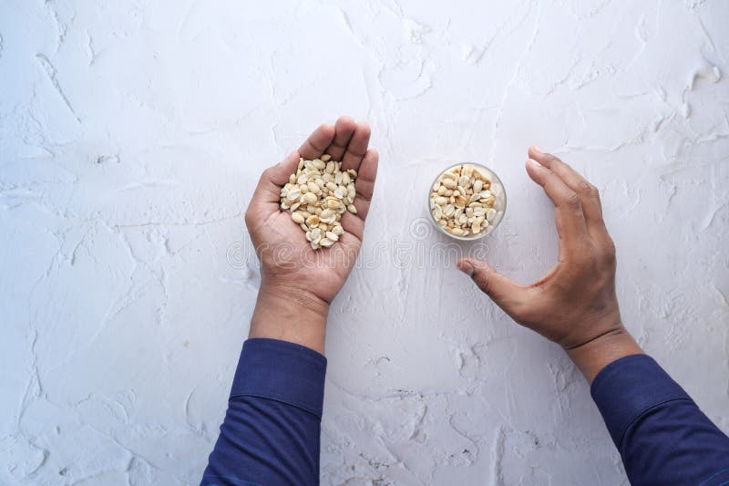 Top View of Hand Pick Peanuts from a Jar Stock Image - Image of brown ...