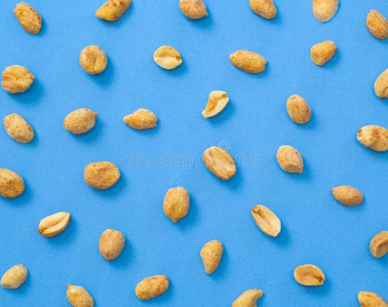 Peanuts on Blue stock photo. Image of calorie, peeled - 219348644