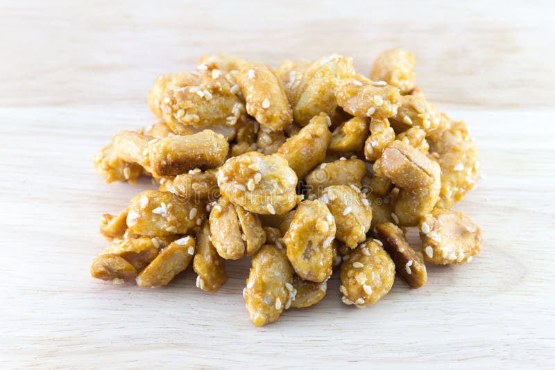 Peanuts in Caramel with Sesame Seeds Stock Photo - Image of caramel ...