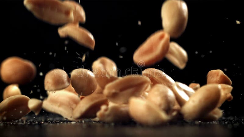 Peanuts Fall on the Table. Filmed on a High-speed Camera at 1000 Fps ...