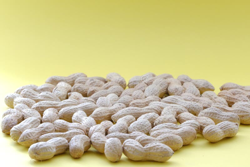Peanuts Isolated on Yellow Background Stock Photo - Image of snack ...