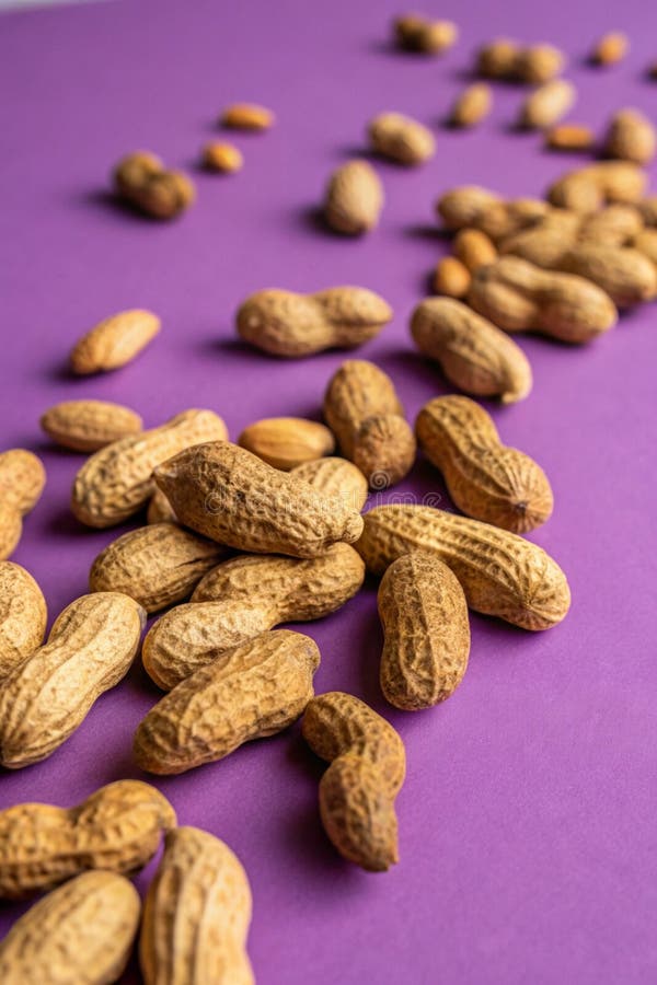 Peanuts on Purple Background Stock Image - Image of closeup, vibrant ...
