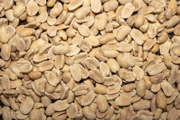 The Peanuts are Raw and Peeled.Peanuts are Split Stock Image - Image of ...