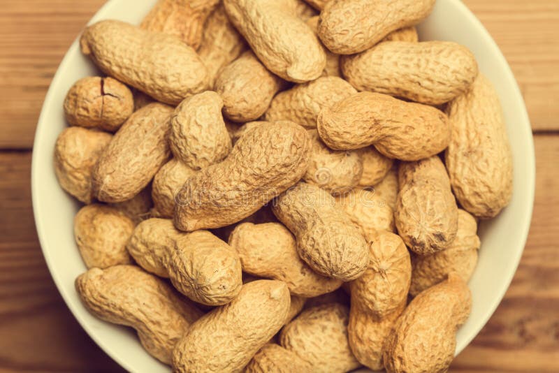 Peanuts with Shell in a Bowl Stock Photo - Image of peanut, roasted ...