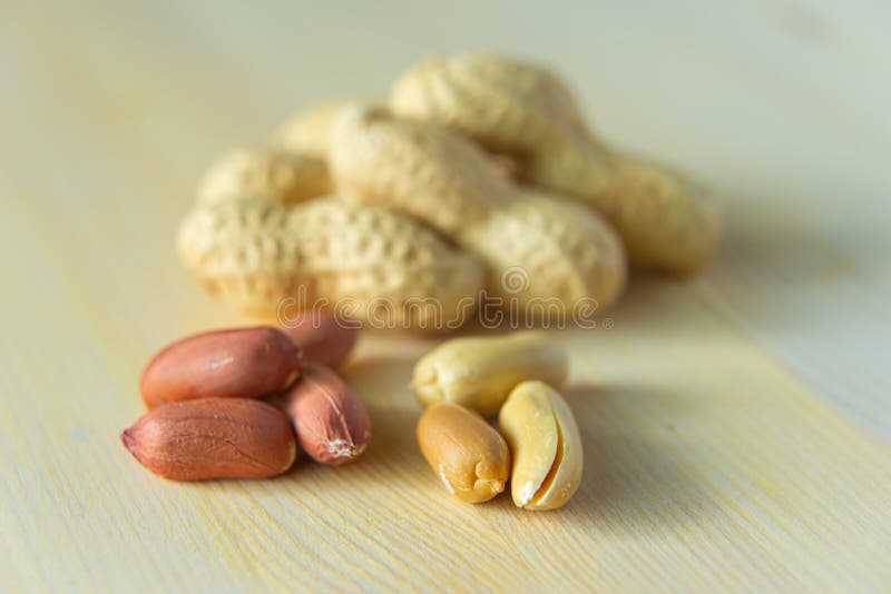 Peanuts on a Wooden Surface Stock Photo - Image of peanut, health ...