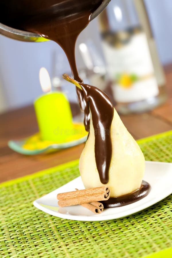 Pear in chocolate stock image. Image of food, cinnamon - 18142883