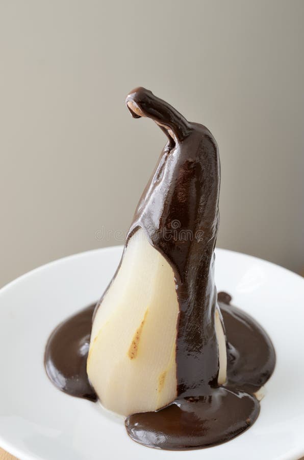 Pear with chocolate stock photo. Image of delicacy, pear - 1444860