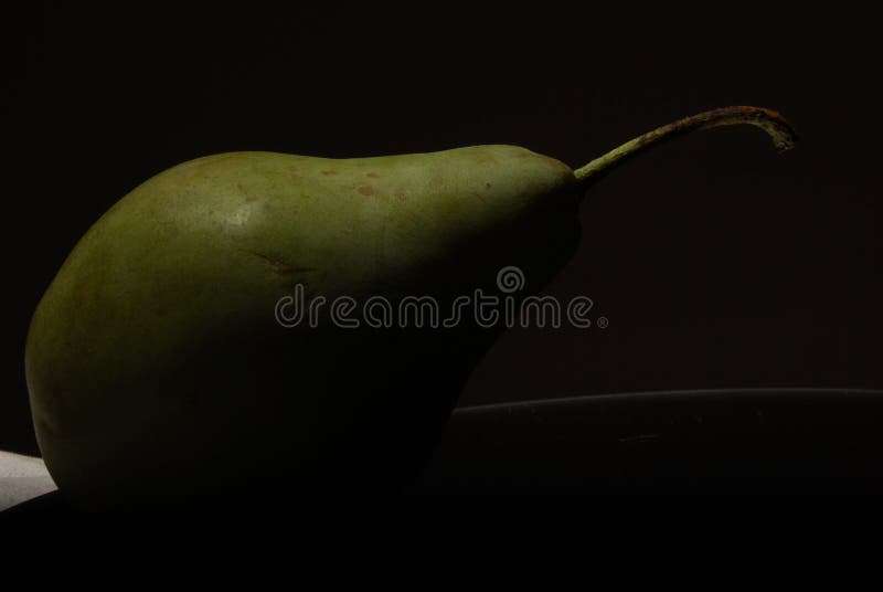 PEAR in CLOSE-UP with DARK BACKGROUND Stock Photo - Image of scale ...