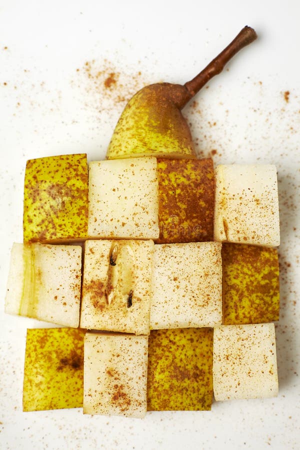 Pear in cubes pieces stock image. Image of fruits, yellow - 34441003