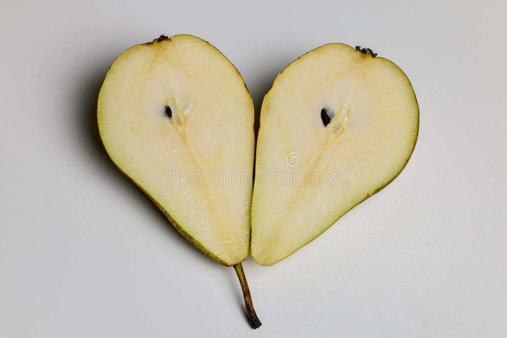 A Pear Cut in Half in the Shape of a Heart Stock Image - Image of ...
