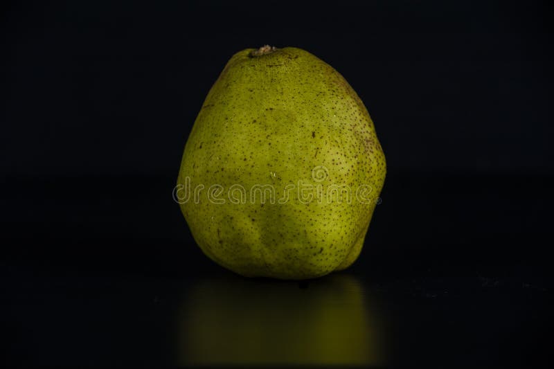Pear in dark on black stock image. Image of surface, glossy - 48942277