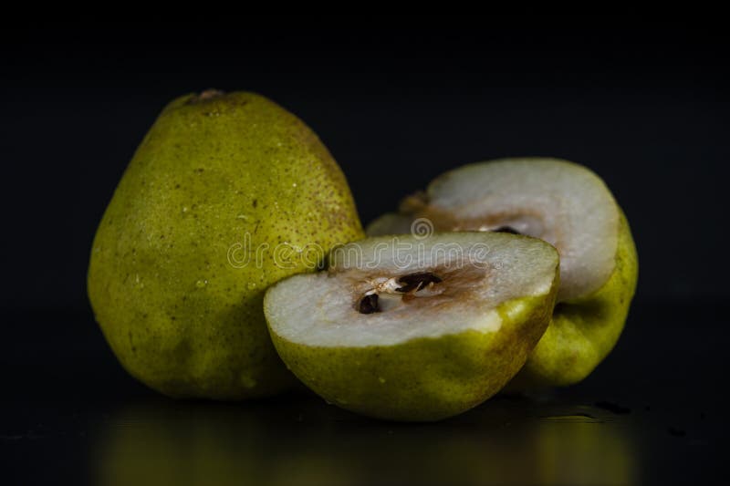 Pear in dark on black stock photo. Image of life, fruit - 48942388