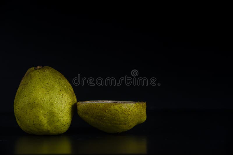 Pear in dark on black stock image. Image of background - 48942491