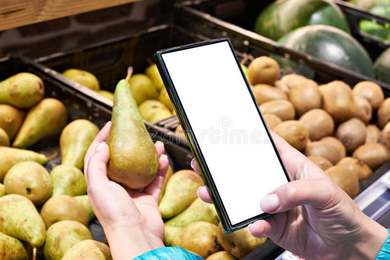 Pear Fruit in Hand and Smartphone Stock Image - Image of shop, hands ...