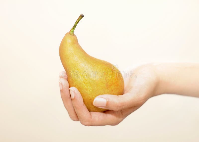 Pear in the hand stock photo. Image of positivity, fruit - 2158320