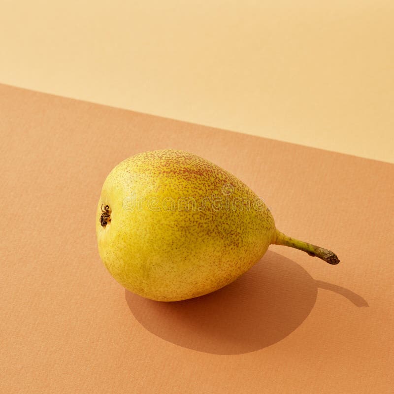 Pear with long shadow stock image. Image of organic - 127186537
