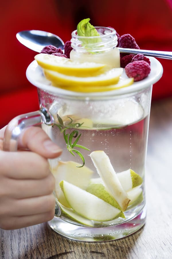 Pear and Raspberry, Rosemary, Lemon Infusion Stock Photo - Image of ...