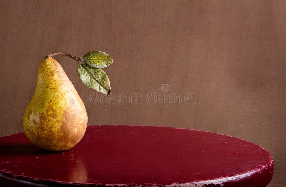 Pear on a rustic stool stock photo. Image of beauty, artistic - 23925430